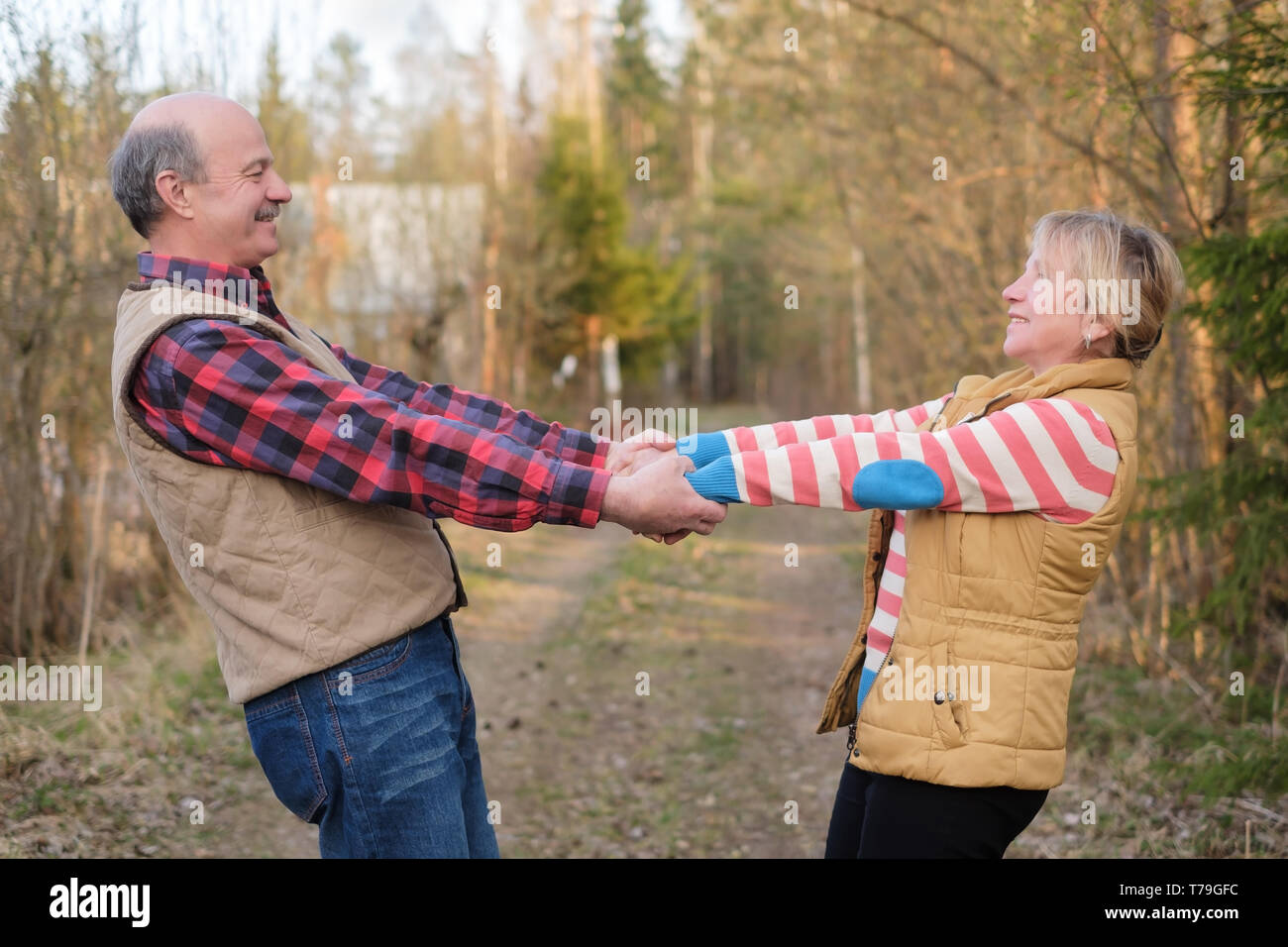 Mature couple holding hands trusting each other. Concept of true love ...