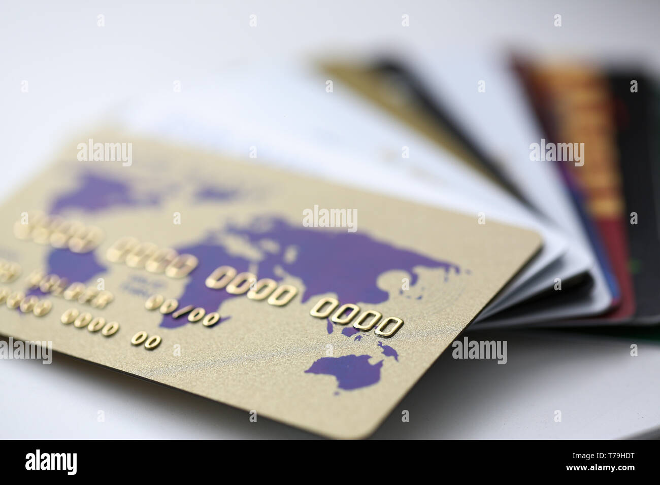 Many bank cards scattered on table Stock Photo - Alamy