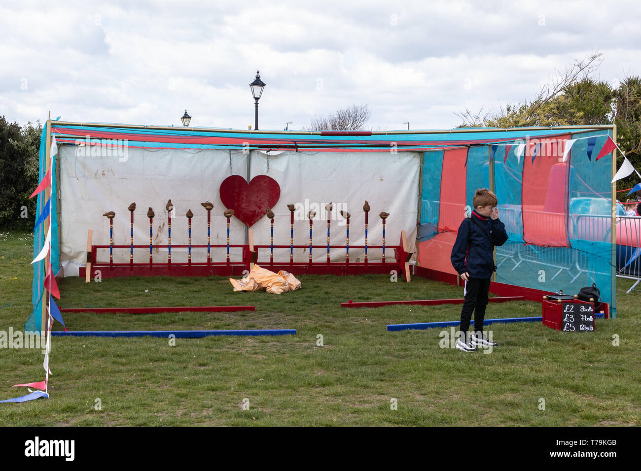 Coconut shy game at the fair hi-res stock photography and images - Alamy
