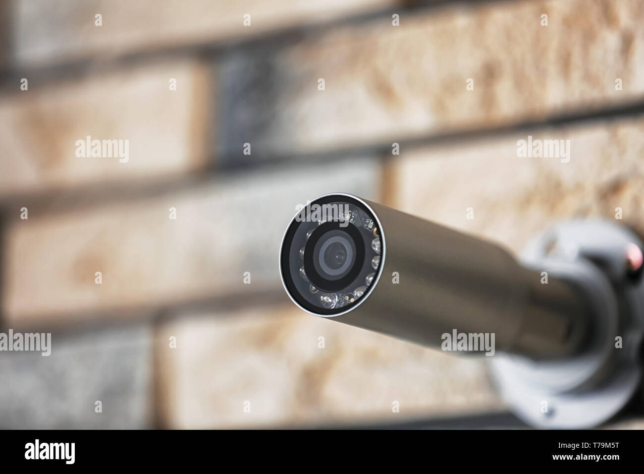 Modern CCTV camera installed on wall Stock Photo - Alamy
