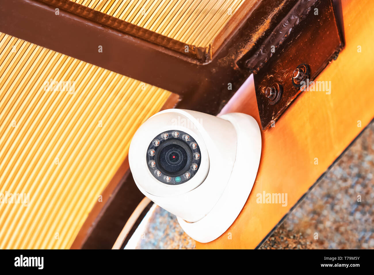 Modern CCTV camera installed on wall of building outdoors Stock Photo ...