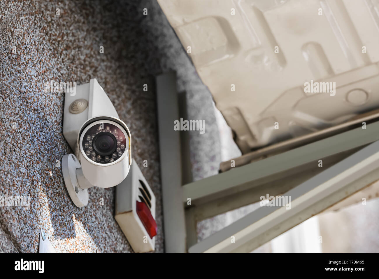 Modern CCTV camera installed on wall of building outdoors Stock Photo ...