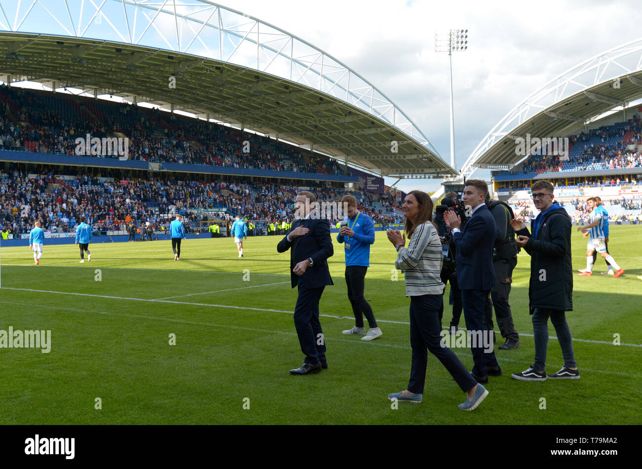 Huddersfield Town Chairman Dean Hoyle salutes the fans after his final ...