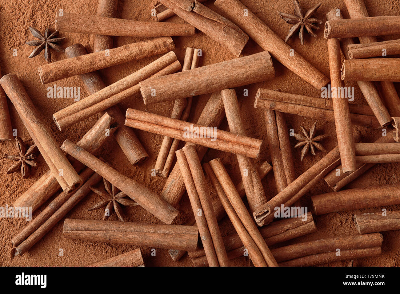Many cinnamon sticks on powder Stock Photo - Alamy