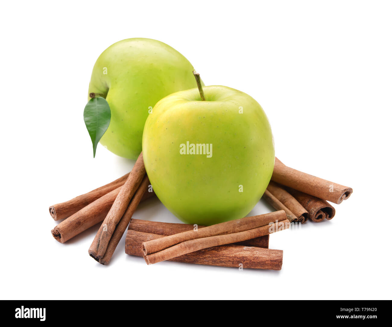 Fresh apples and cinnamon sticks on white background Stock Photo - Alamy