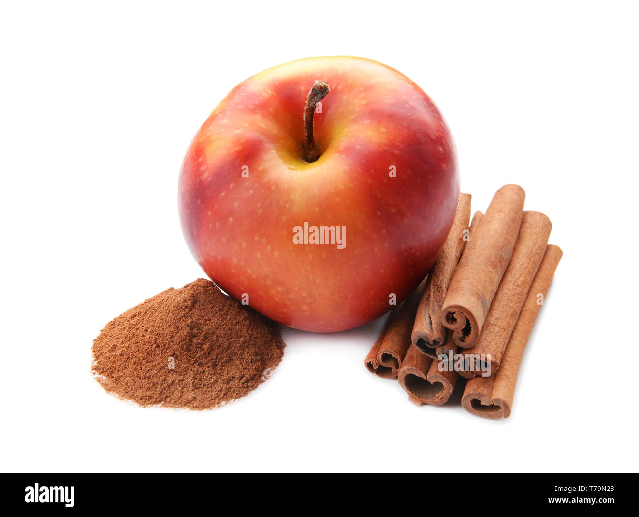 Fresh apple with cinnamon sticks and powder on white background Stock ...