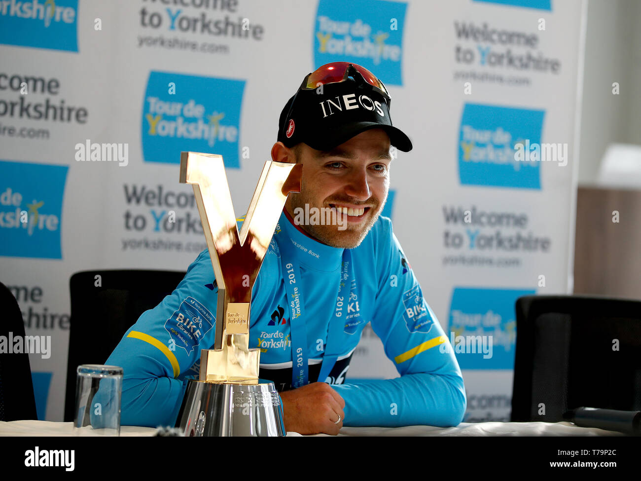 Team Ineos' Christopher Lawless with the trophy after winning the Tour ...