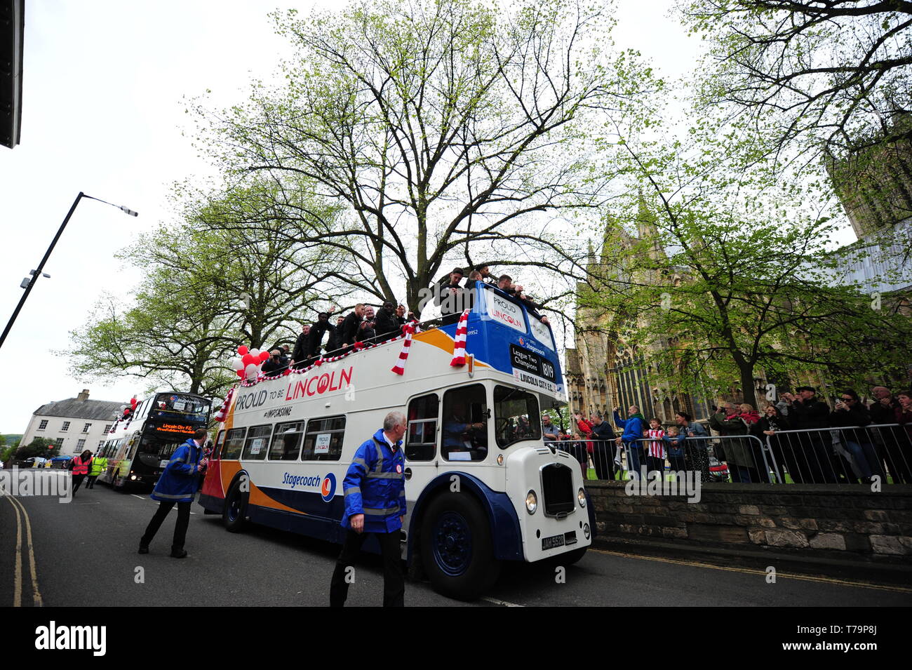 Buses pass Lincoln cathedral during the victory parade through Lincoln ...