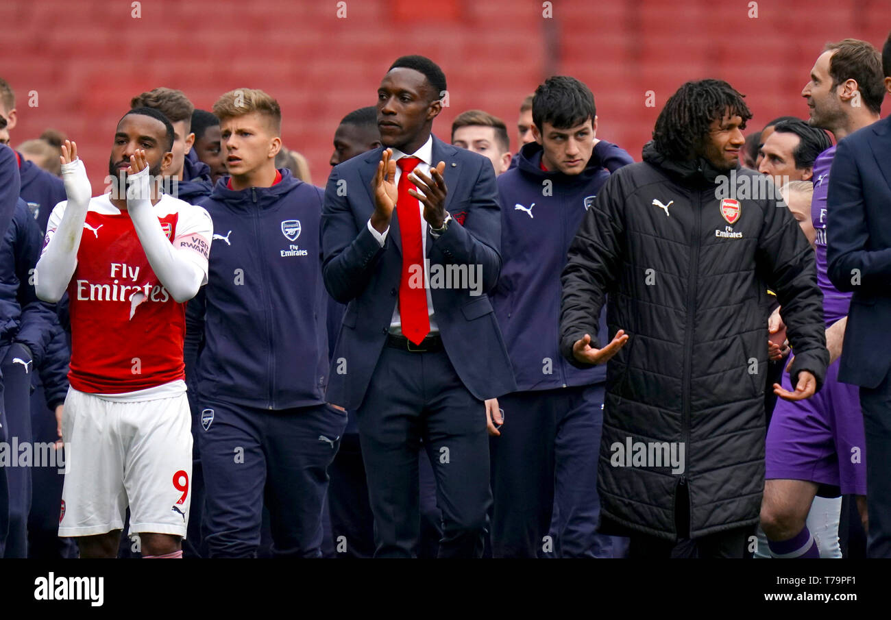 Arsenal's Danny Welbeck (centre) applauds the fans after the final ...