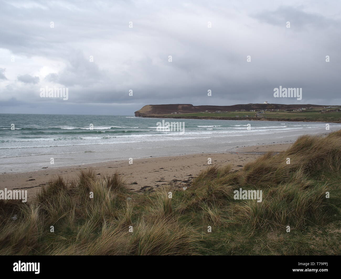 Waves breaking on the beach at Dunnet Bay near Thurso, Scotland looking ...