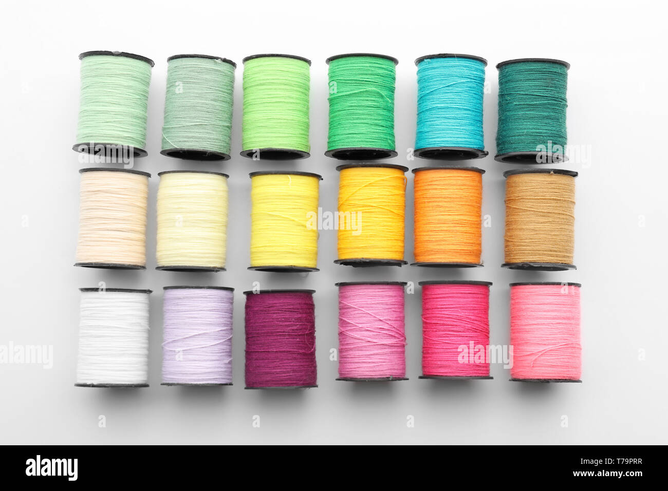 Set of sewing threads on white background Stock Photo - Alamy