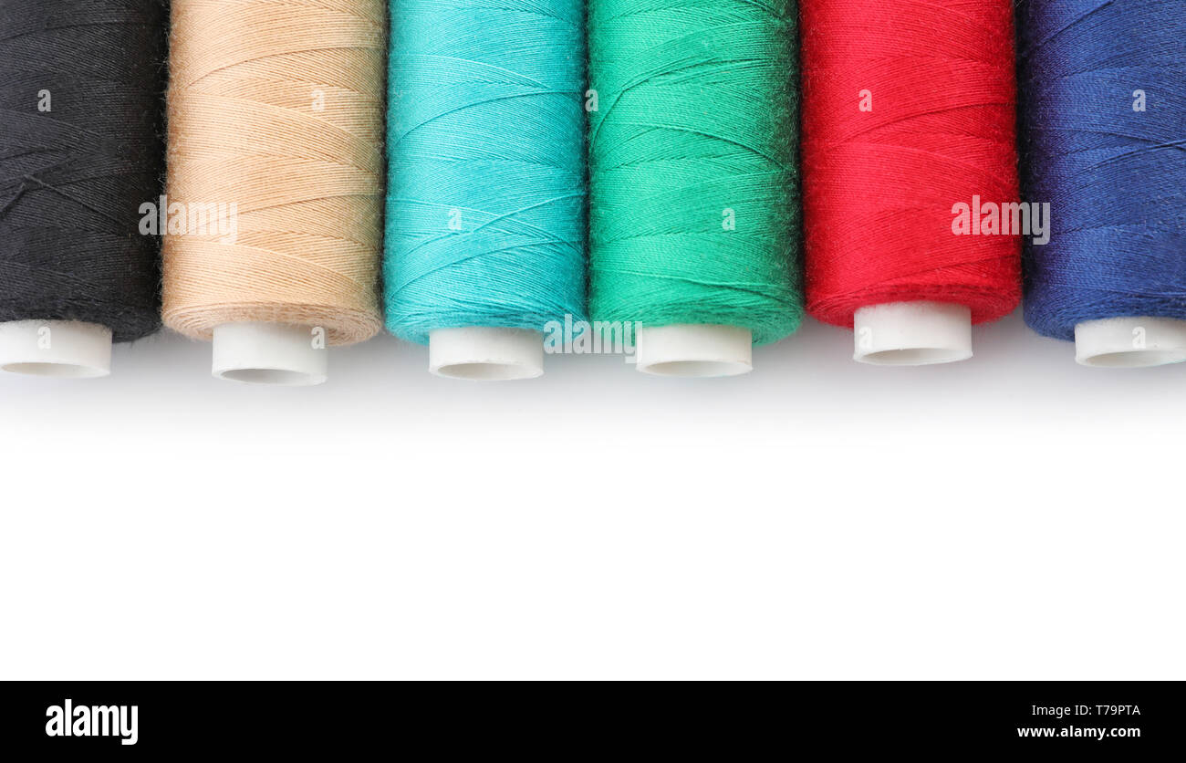 Set of sewing threads on white background Stock Photo - Alamy