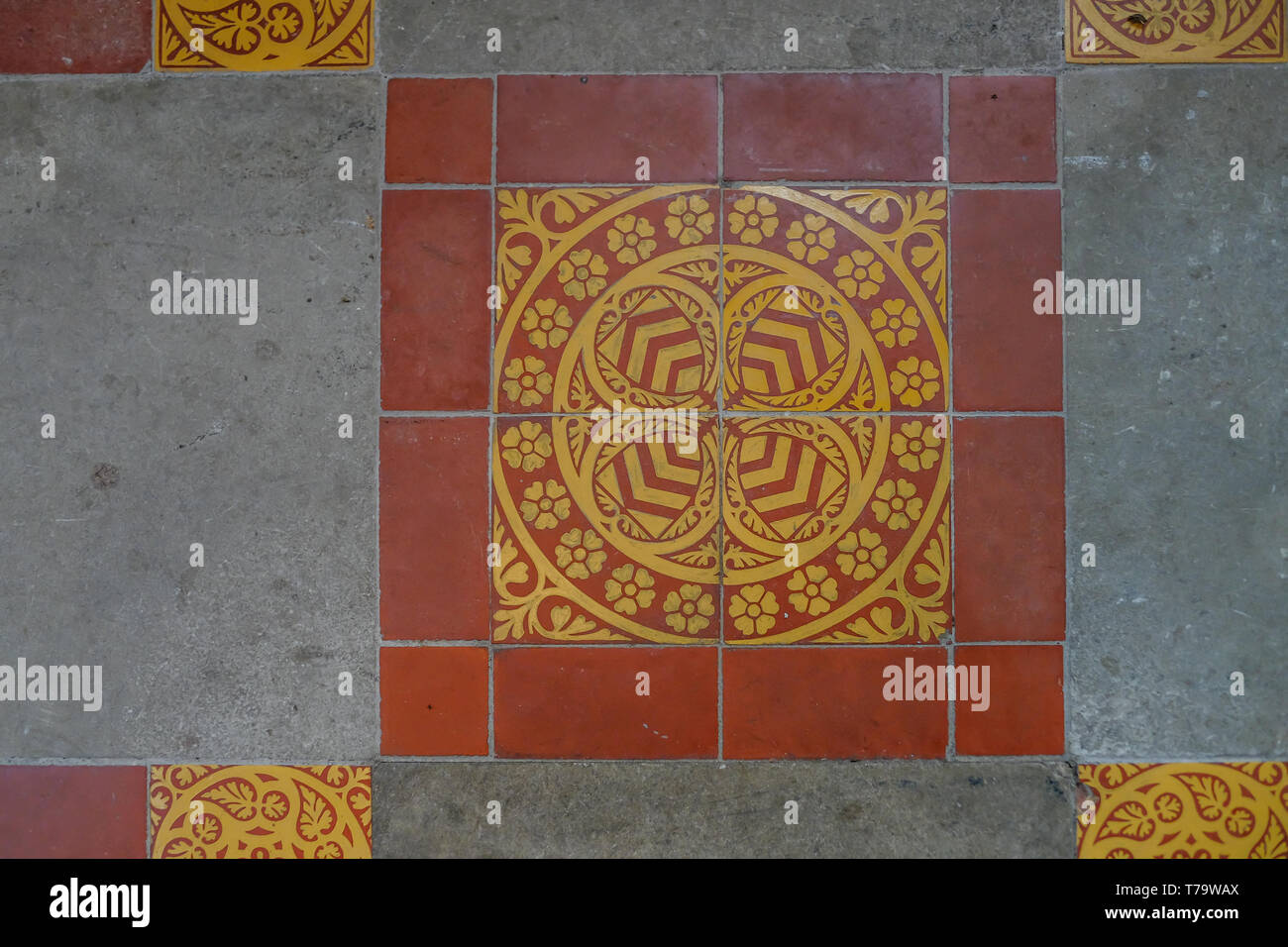Ancient english floor tile closeup. Beautiful traditional patterns in ...