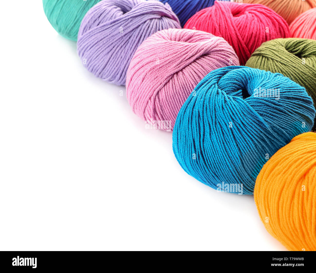 Colorful knitting yarn on white background Stock Photo - Alamy