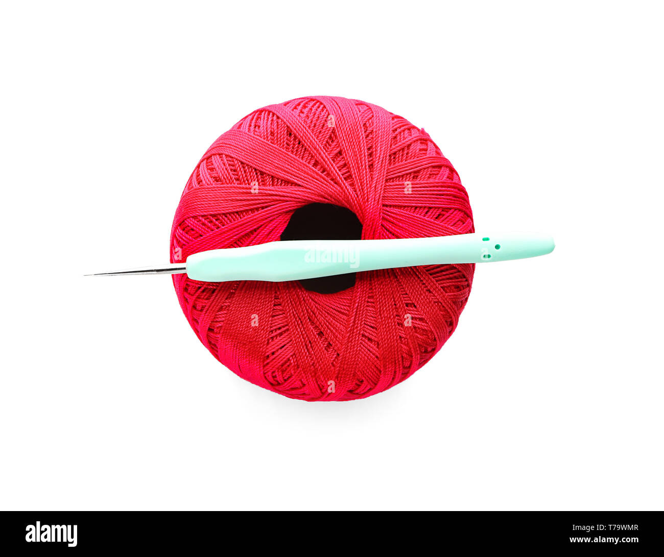 Color crocheting clew with needle on white background Stock Photo - Alamy