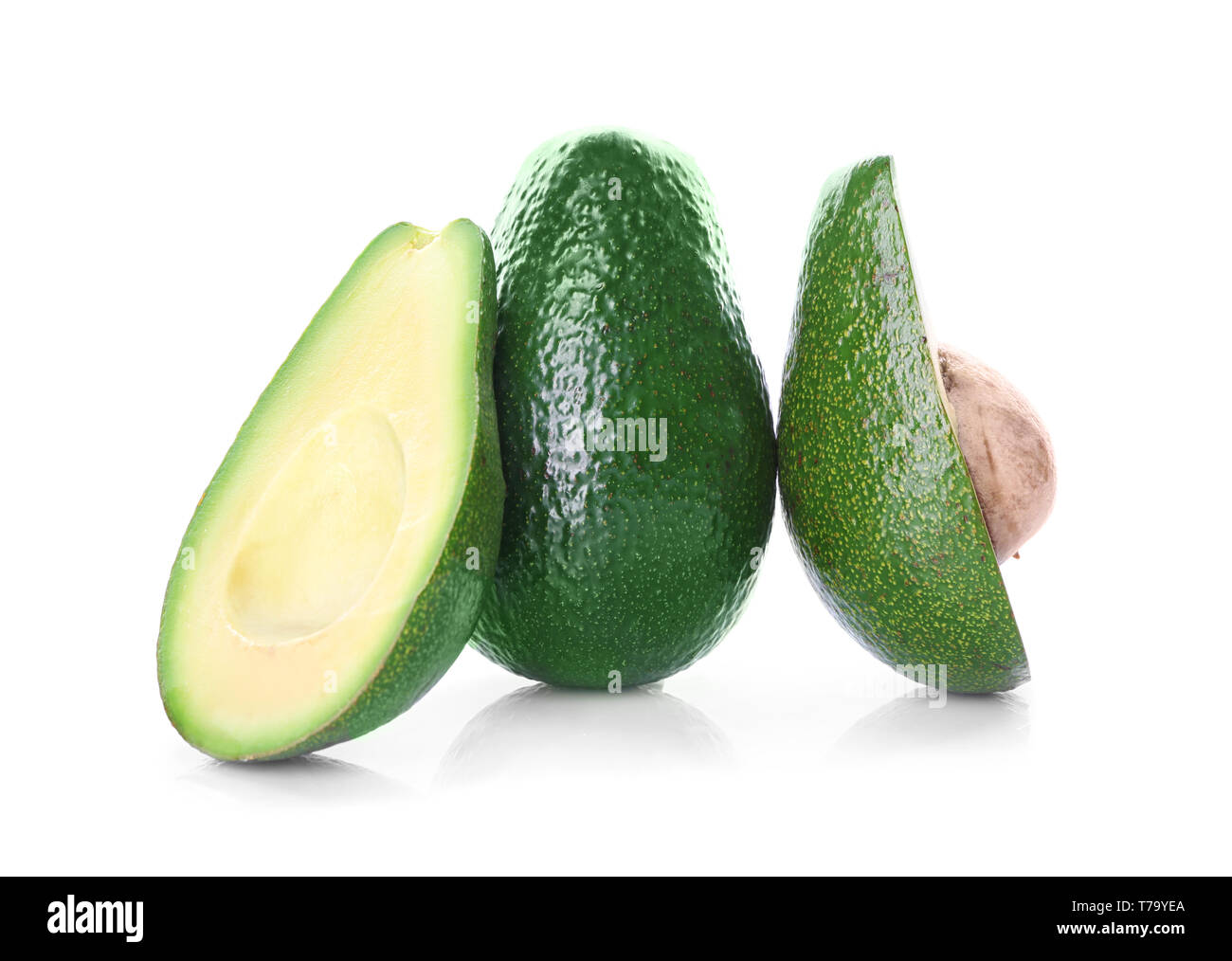 Fresh avocados on white background Stock Photo - Alamy