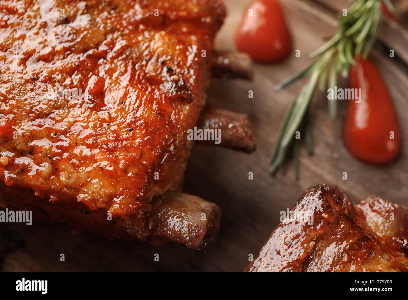 Delicious grilled ribs on board, closeup Stock Photo - Alamy