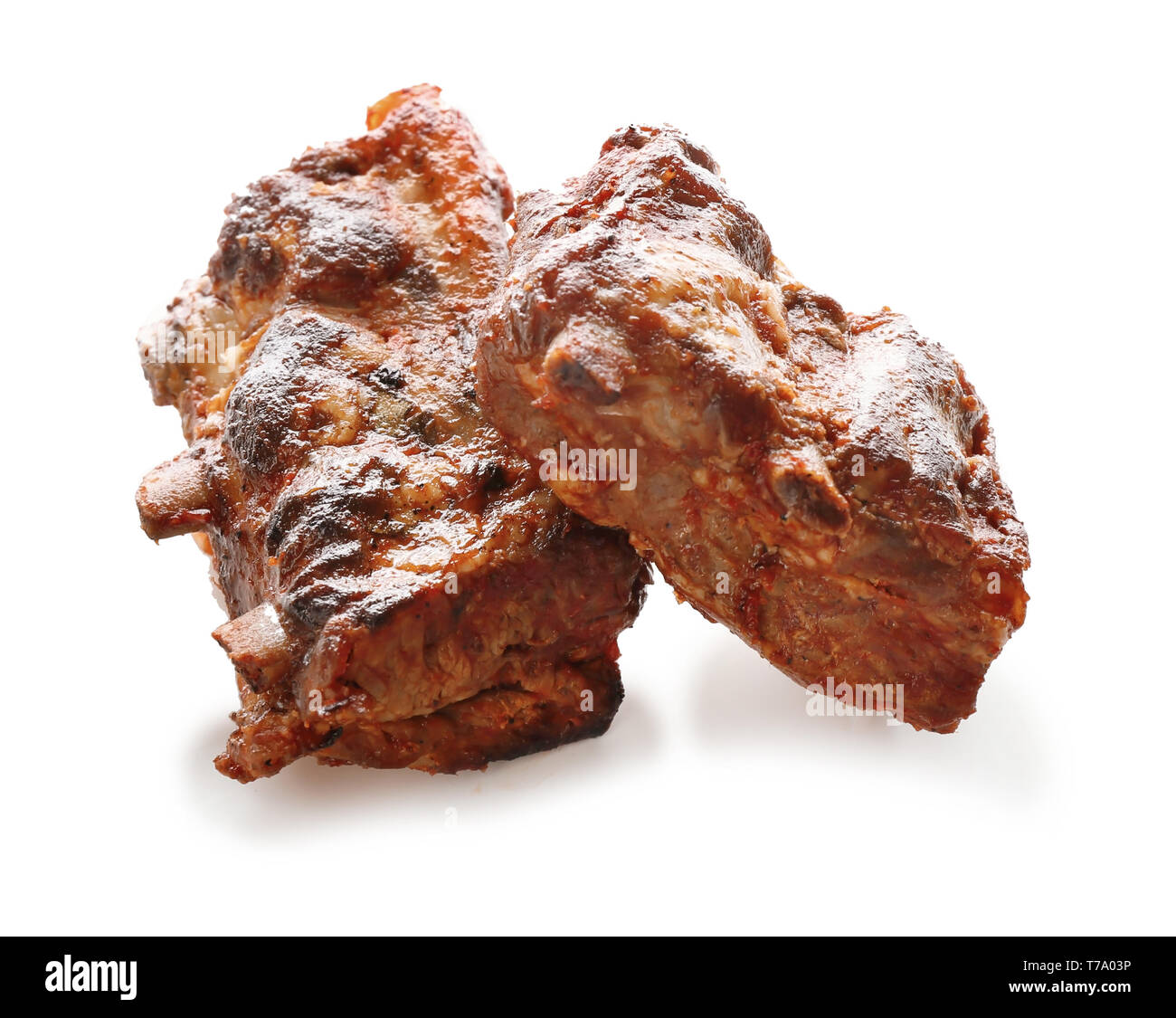 Delicious grilled ribs on white background Stock Photo - Alamy