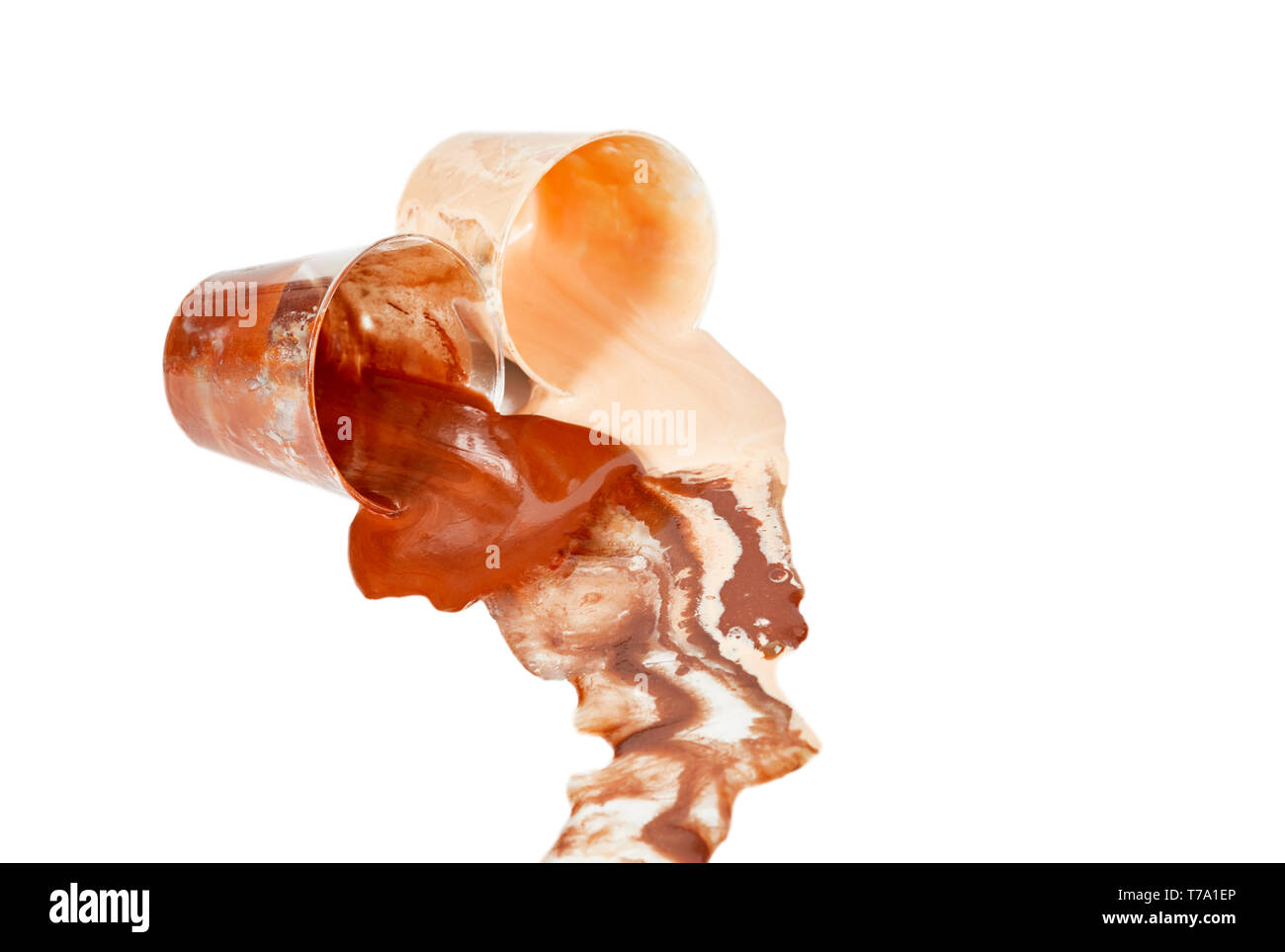 Small bowl of brick red and peach colored acrylic paint laying on its ...