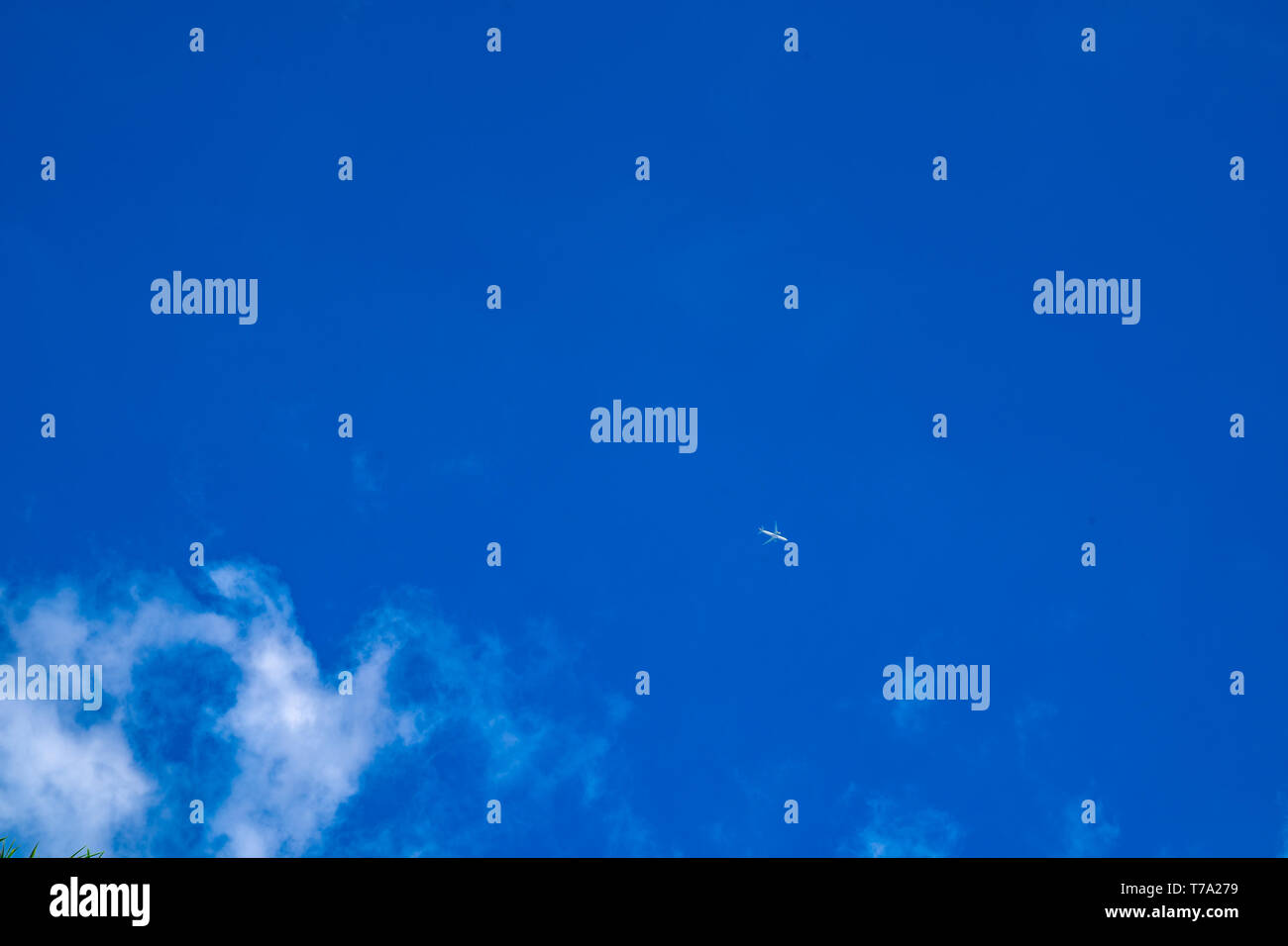 Clearly beautiful blue sky with white line plane Stock Photo - Alamy