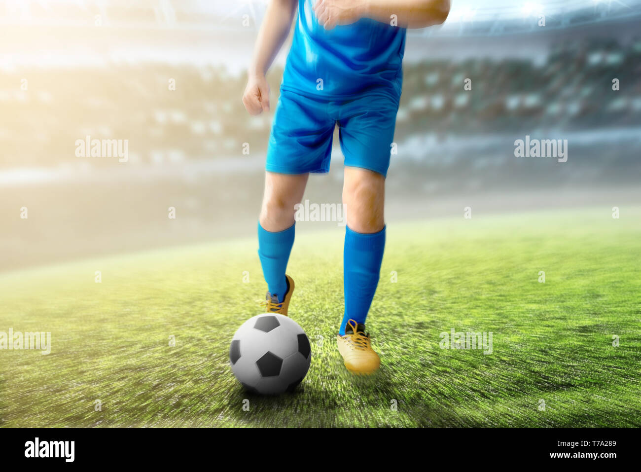 Man kicking ball hi-res stock photography and images - Alamy