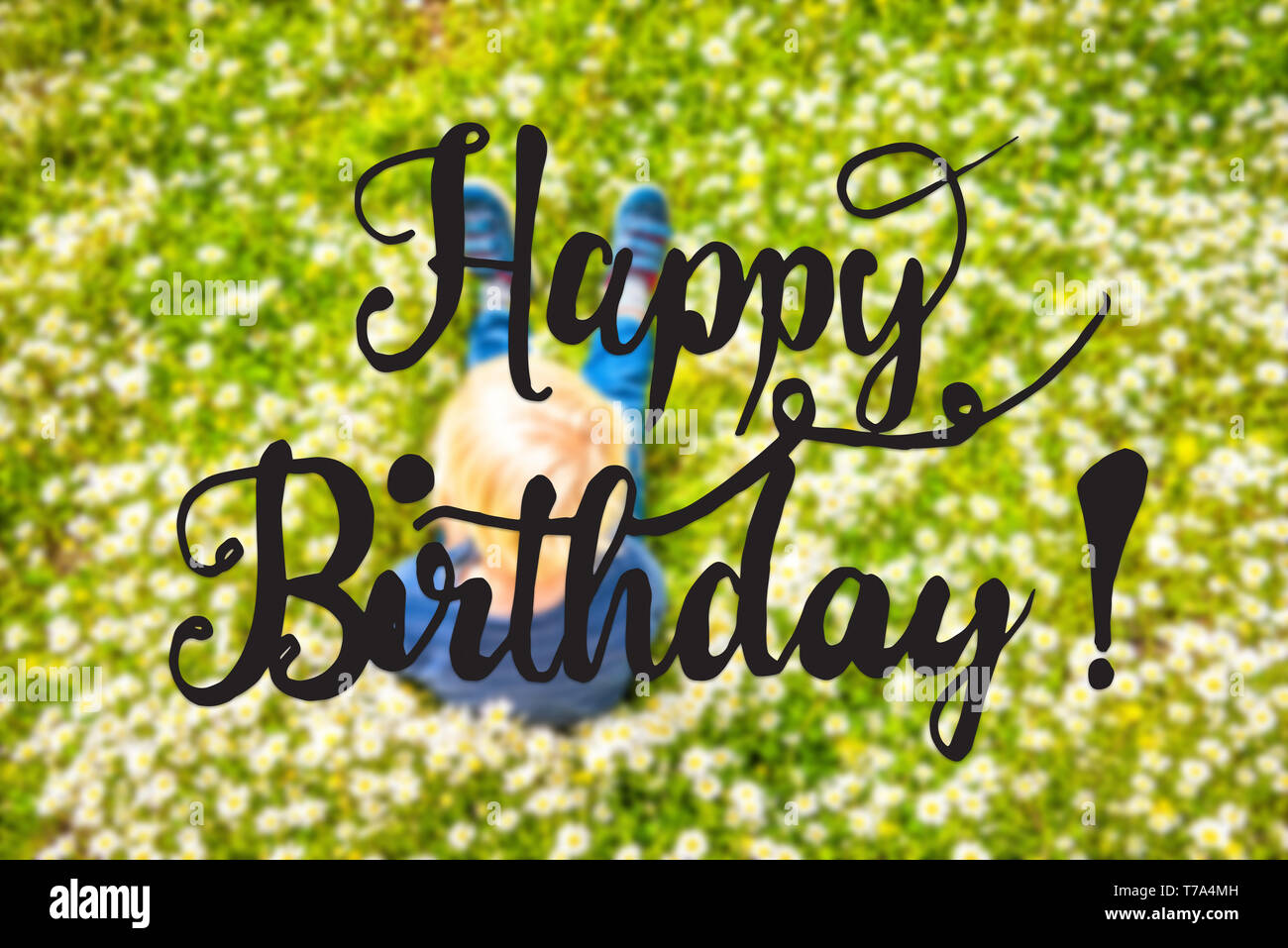 English Calligraphy Happy Birthday. Blonde Child Sitting In A Daisy ...