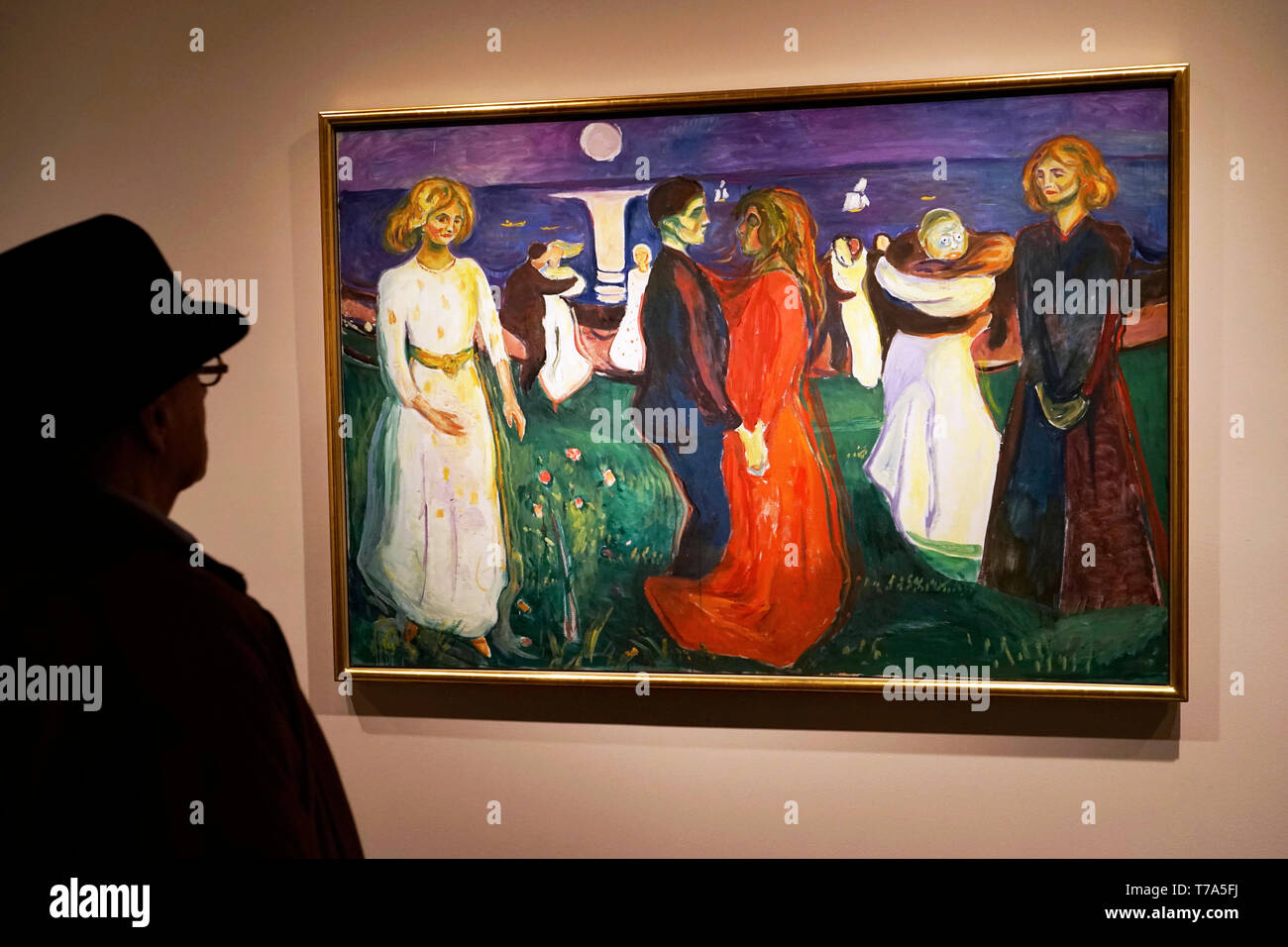 A visitor looking at The Dance of Life. 1925 by Edvard Munch.Munch ...