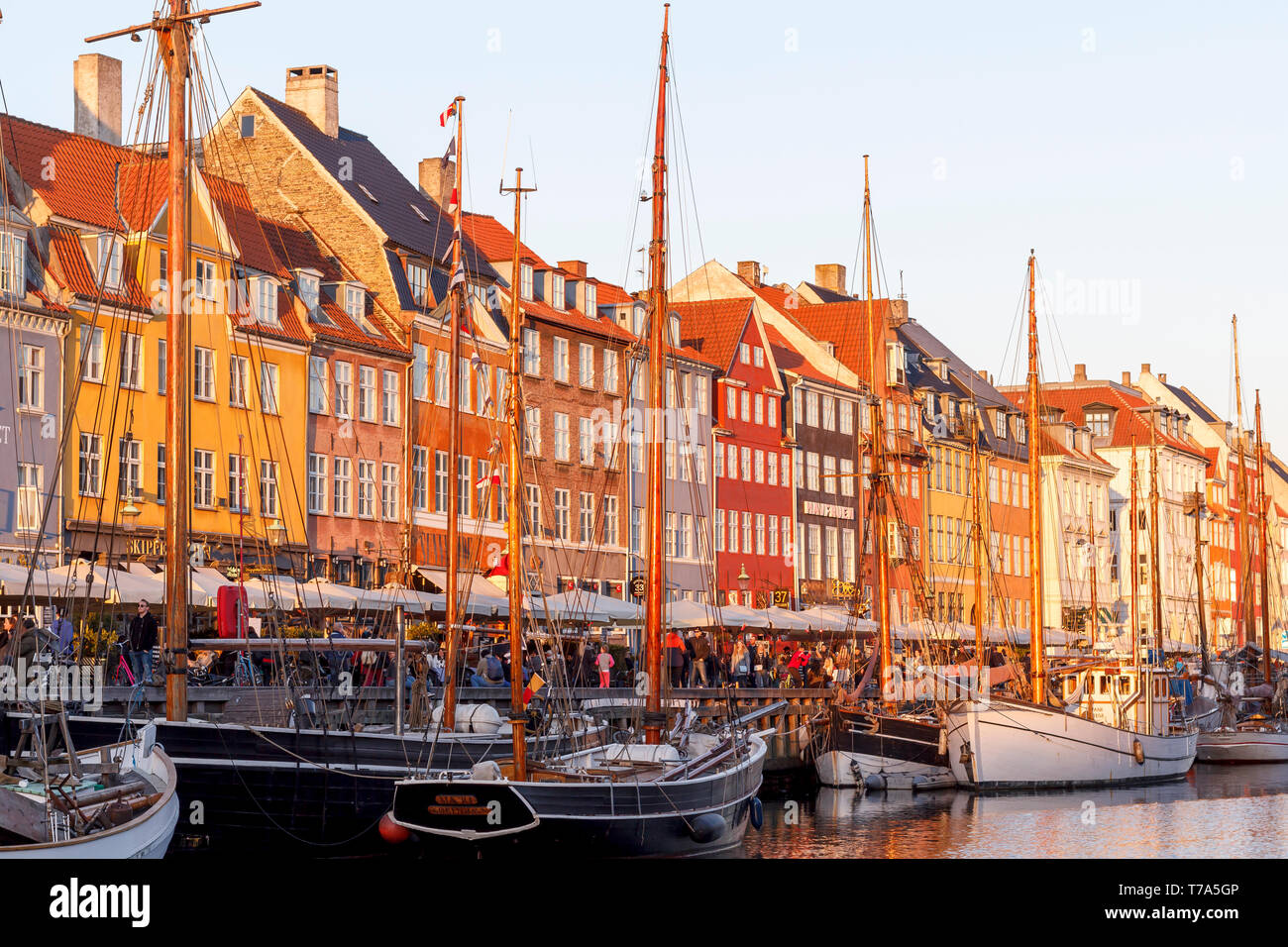Colorful houses and ships at Nyhavn district, an old canal and ...