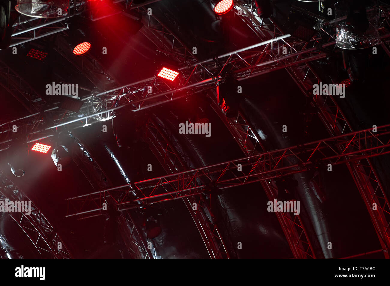 Colorful concert lighting. Red lanterns and spotlights at a concert ...