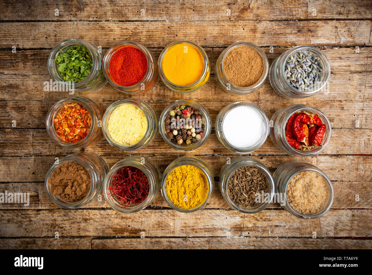 Large collection of spices in small bowls flat lay Stock Photo - Alamy