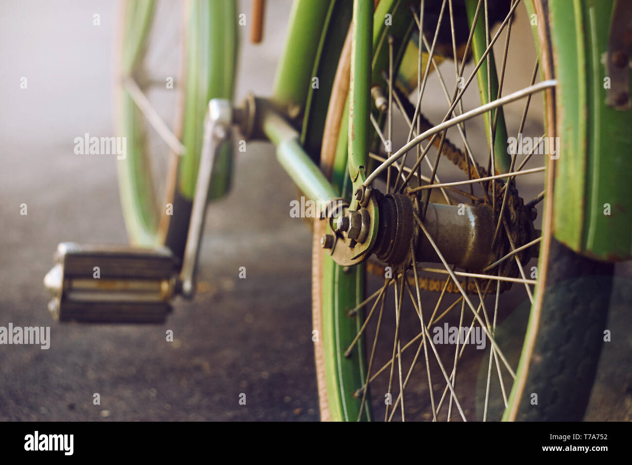 Vintage retro bike nice green color, standing in the afternoon on an ...