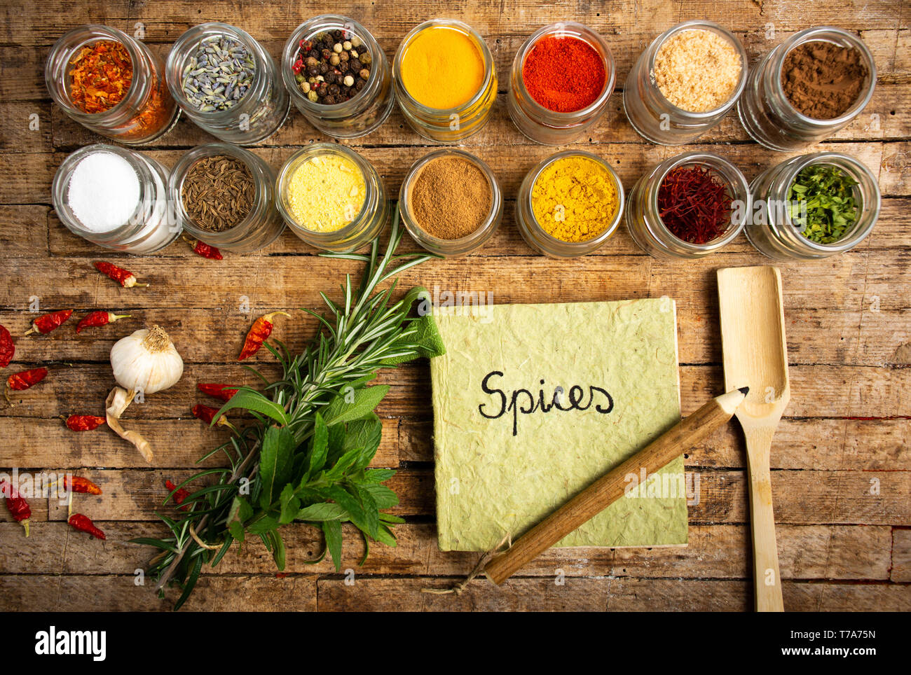 Large collection of spices on a table top view Stock Photo - Alamy