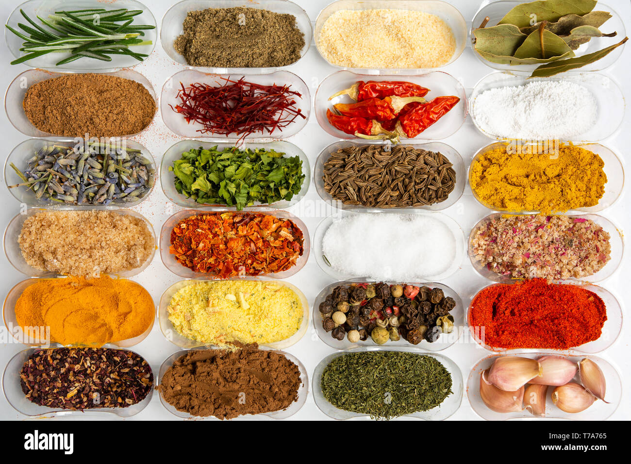 Collection of spices in small bowls flat lay Stock Photo - Alamy