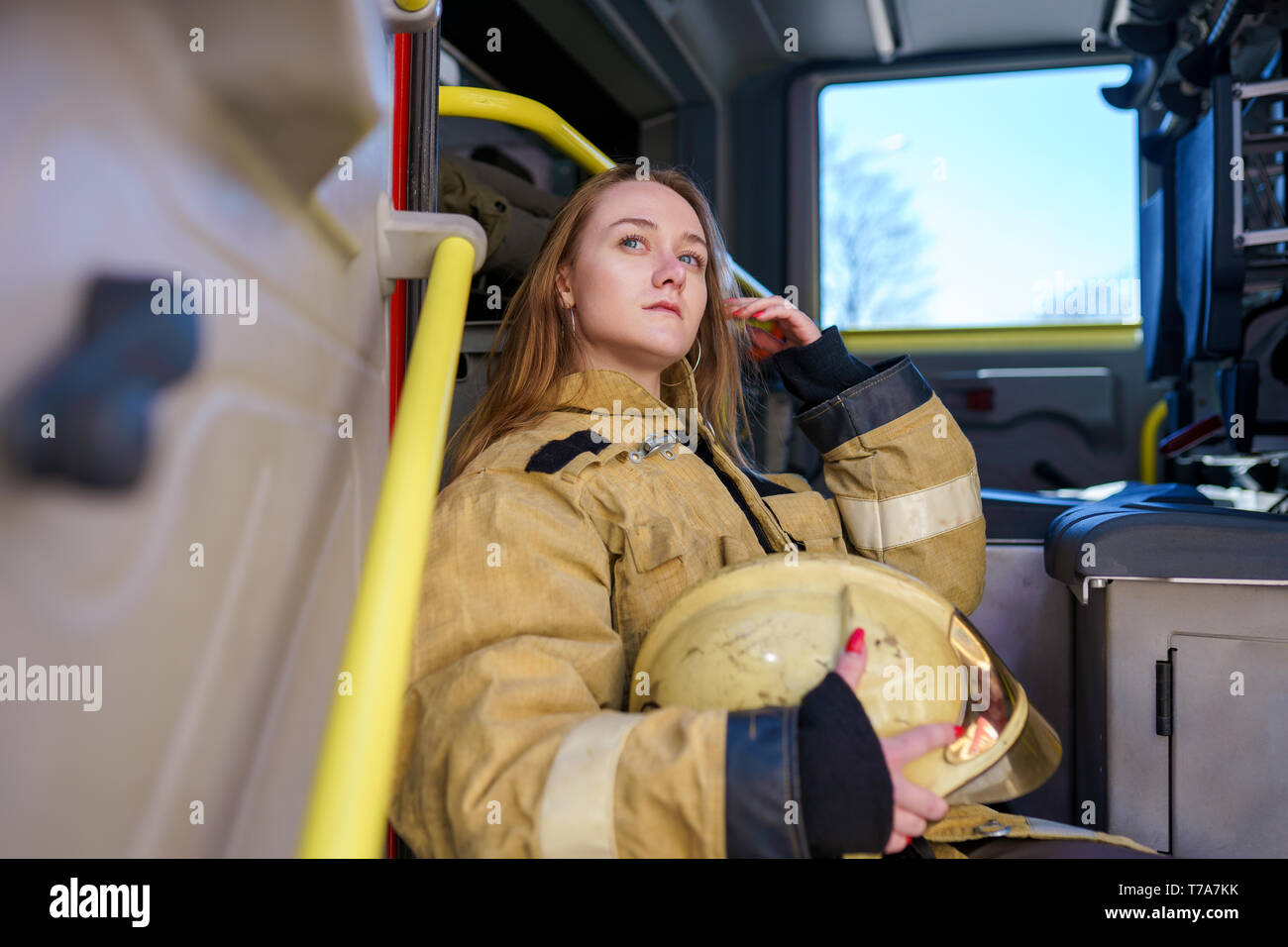 Fireman girl model hi-res stock photography and images - Alamy
