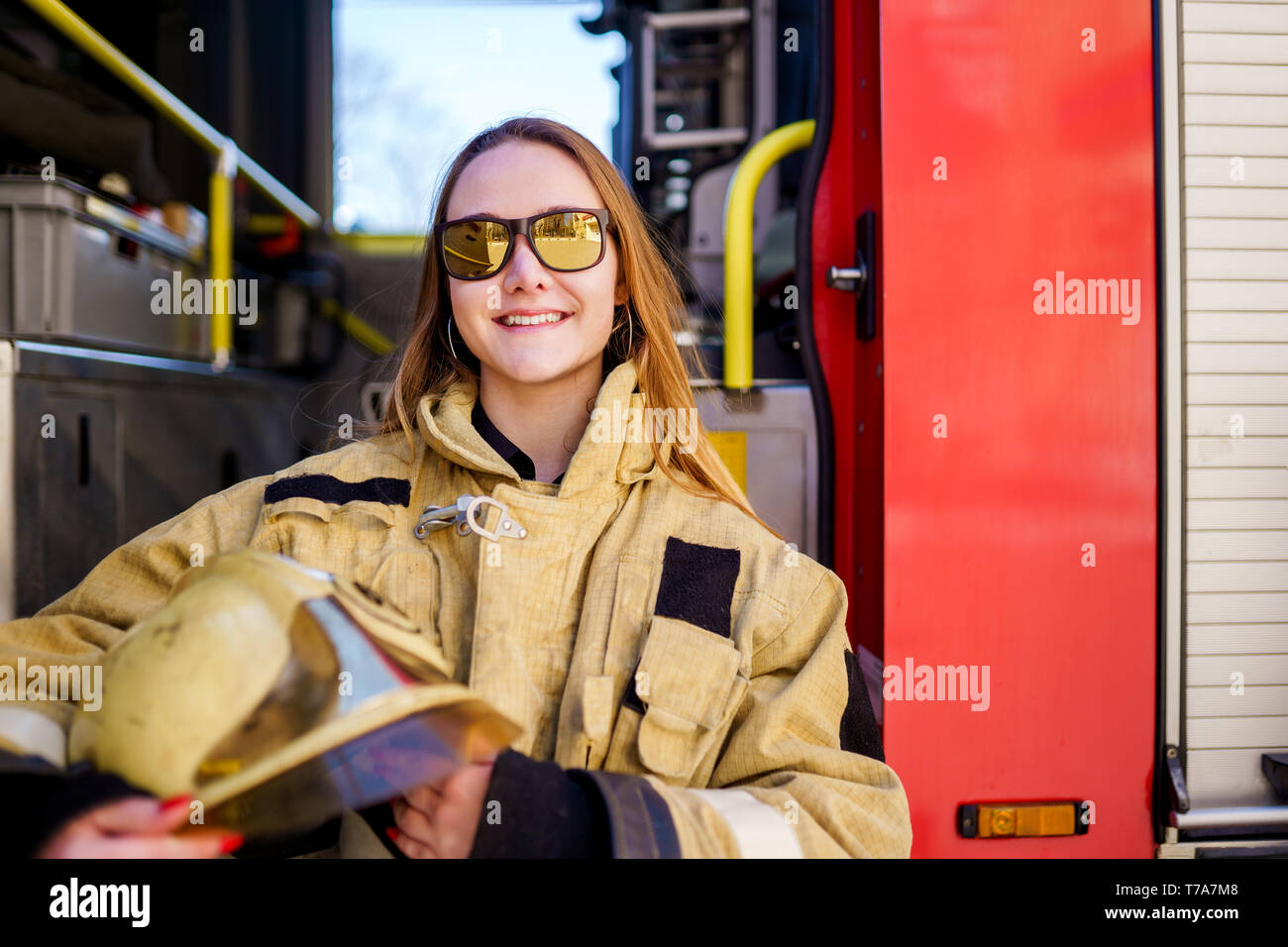 Fireman girl model hi-res stock photography and images - Alamy