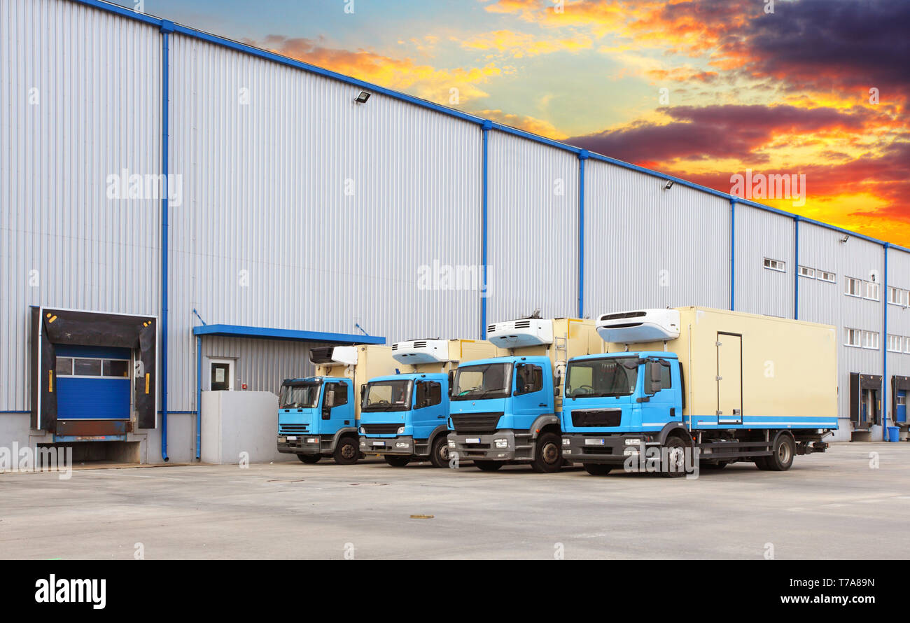 Truck at warehouse building Stock Photo - Alamy