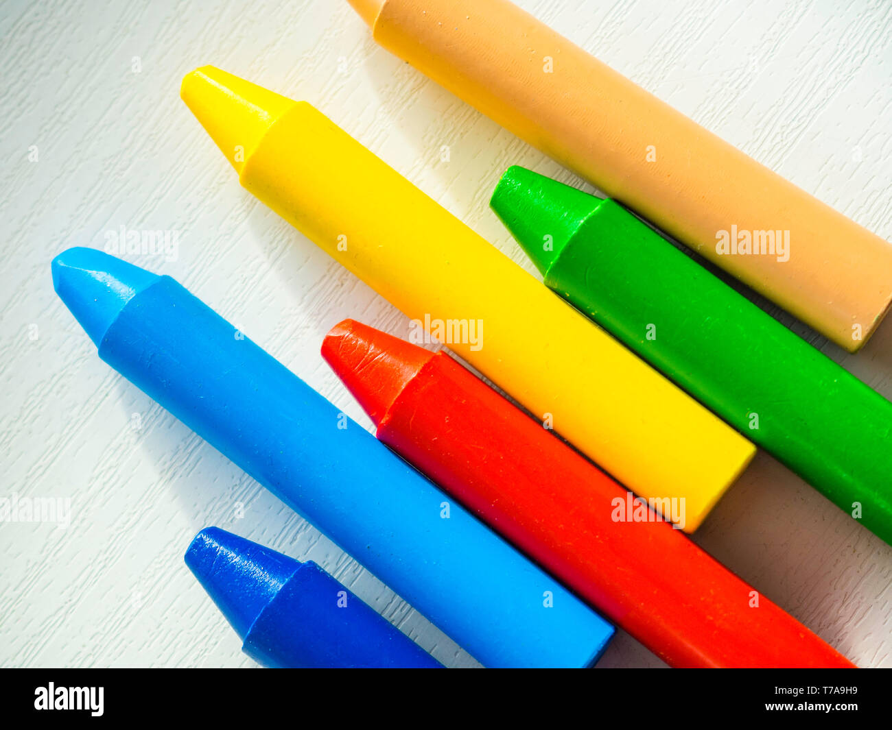 Bright color palette of crayons on the table. 1 September concept ...