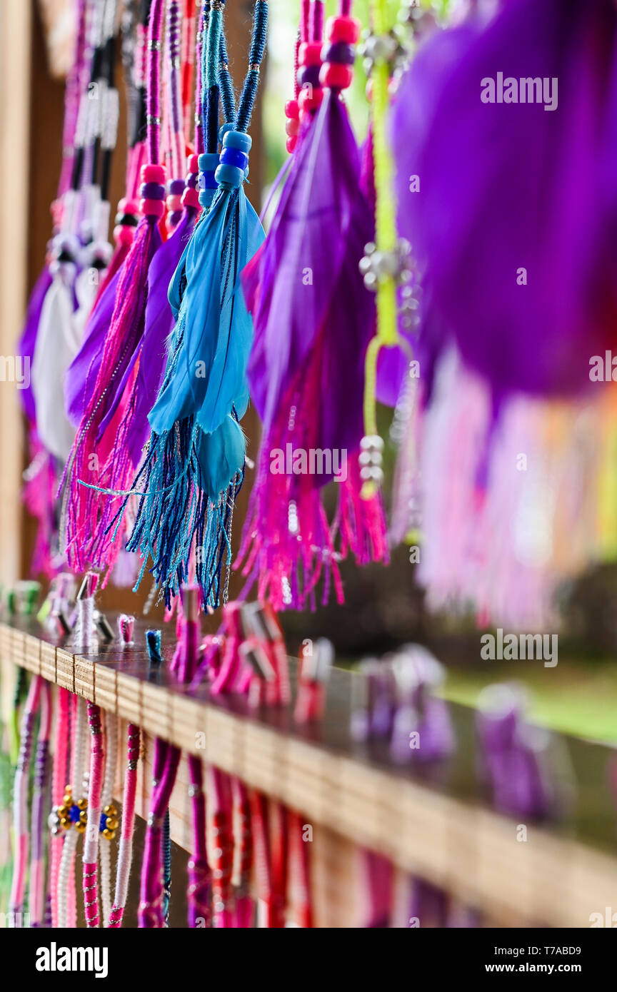 colored feathers of Indians in the storefront. Copy space Stock Photo ...