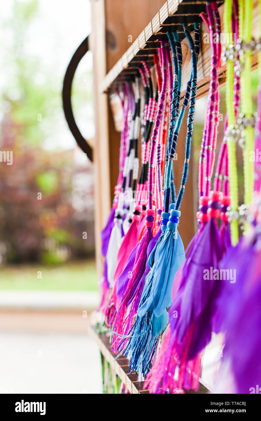 colored feathers of Indians in the storefront. Copy space Stock Photo ...