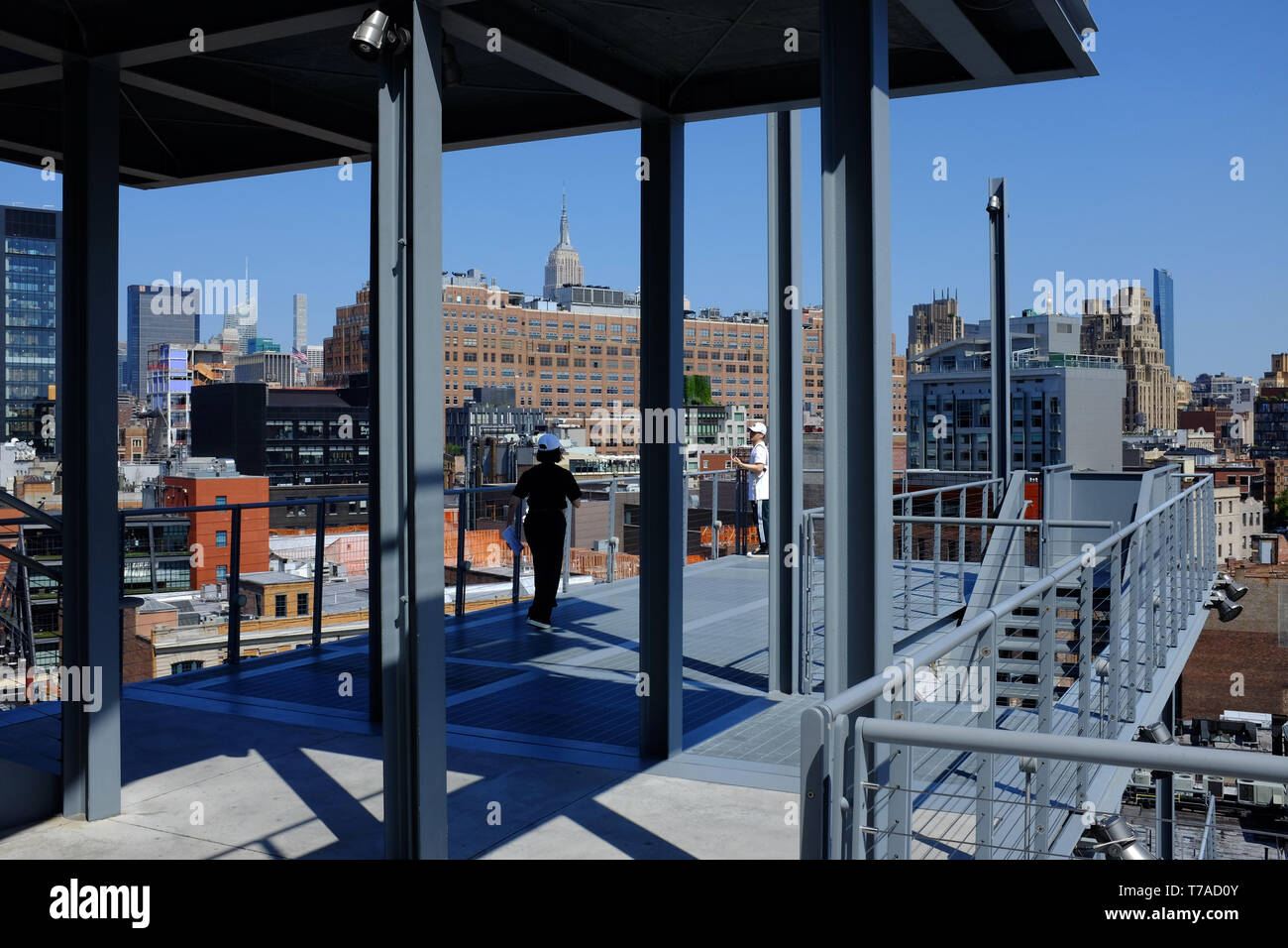 Visitors at outdoor staircases and terrace of Whitney Museum of ...
