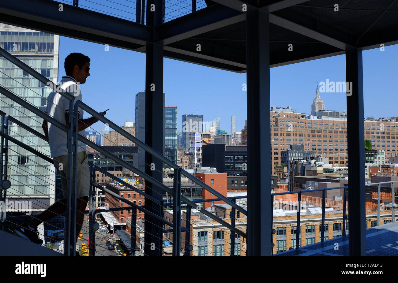 Visitors on staircase of outdoor terrace of Whitney Museum of America ...