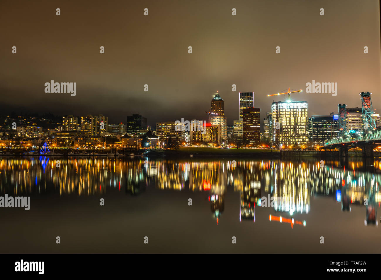 Downtown Portland Skyline At Night with cloudy skies Stock Photo - Alamy