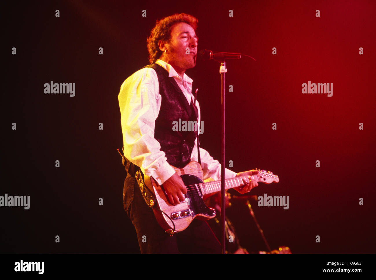 Bruce Springsteen performing at a concert in 1992, at the World Theatre ...