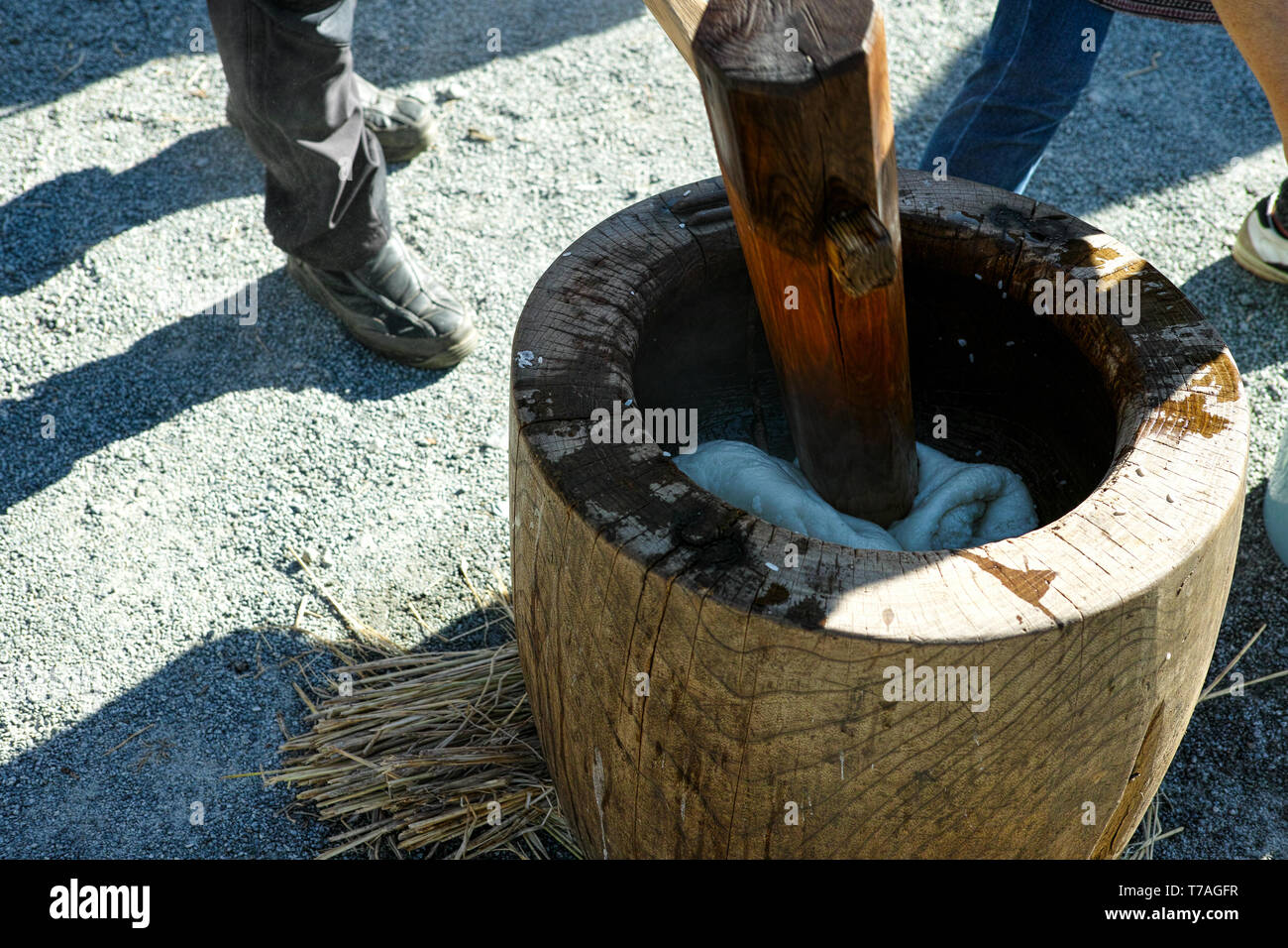 A view of the large pestle while mochi is being made for new year Stock ...