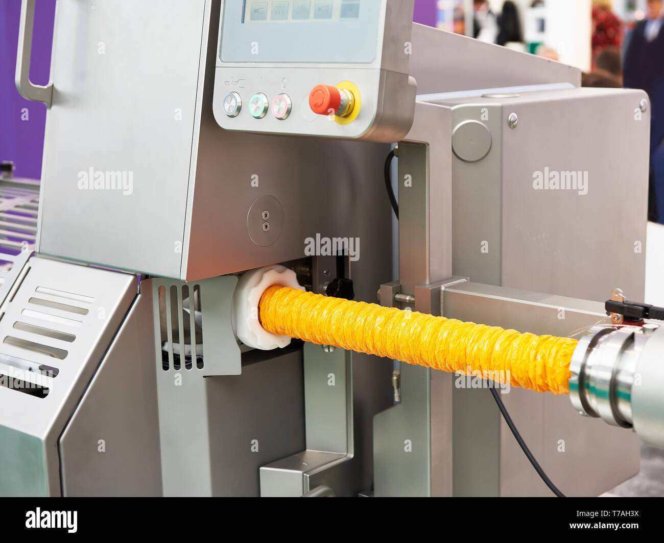 Automatic double clippers for sausages filling machines Stock Photo - Alamy