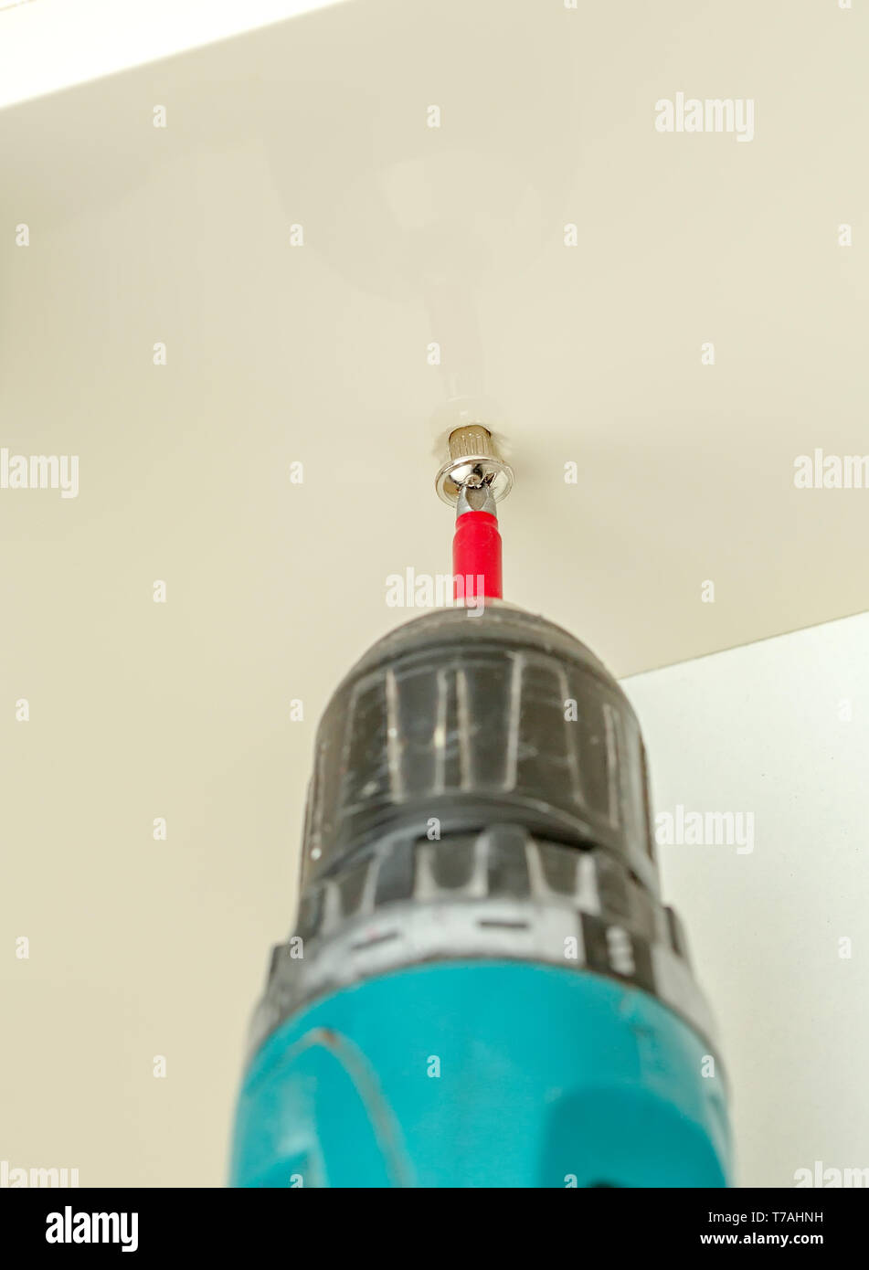 The process of furniture assembly screws closeup Stock Photo - Alamy