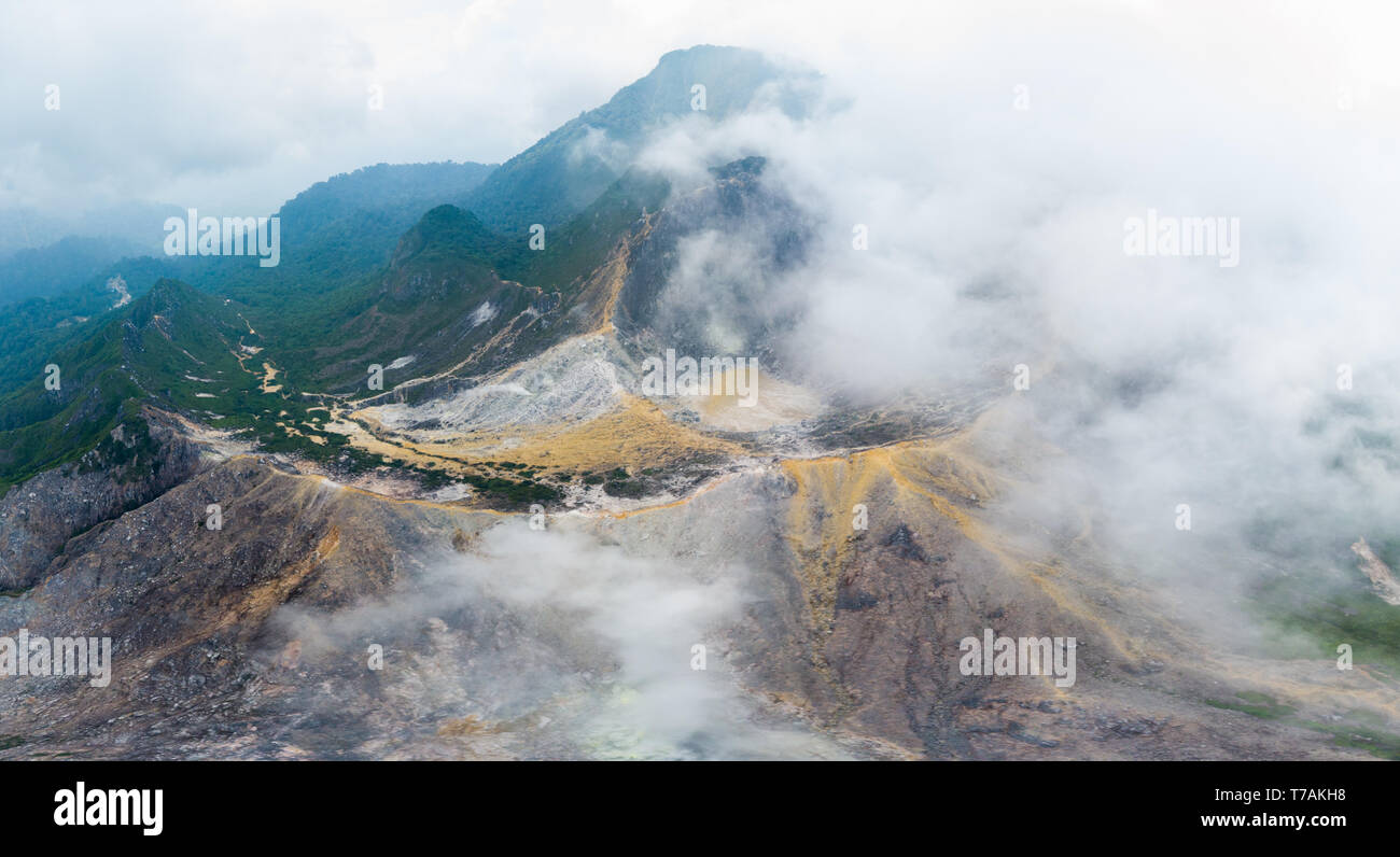 Aerial view Sibayak volcano, active caldera steaming, travel ...