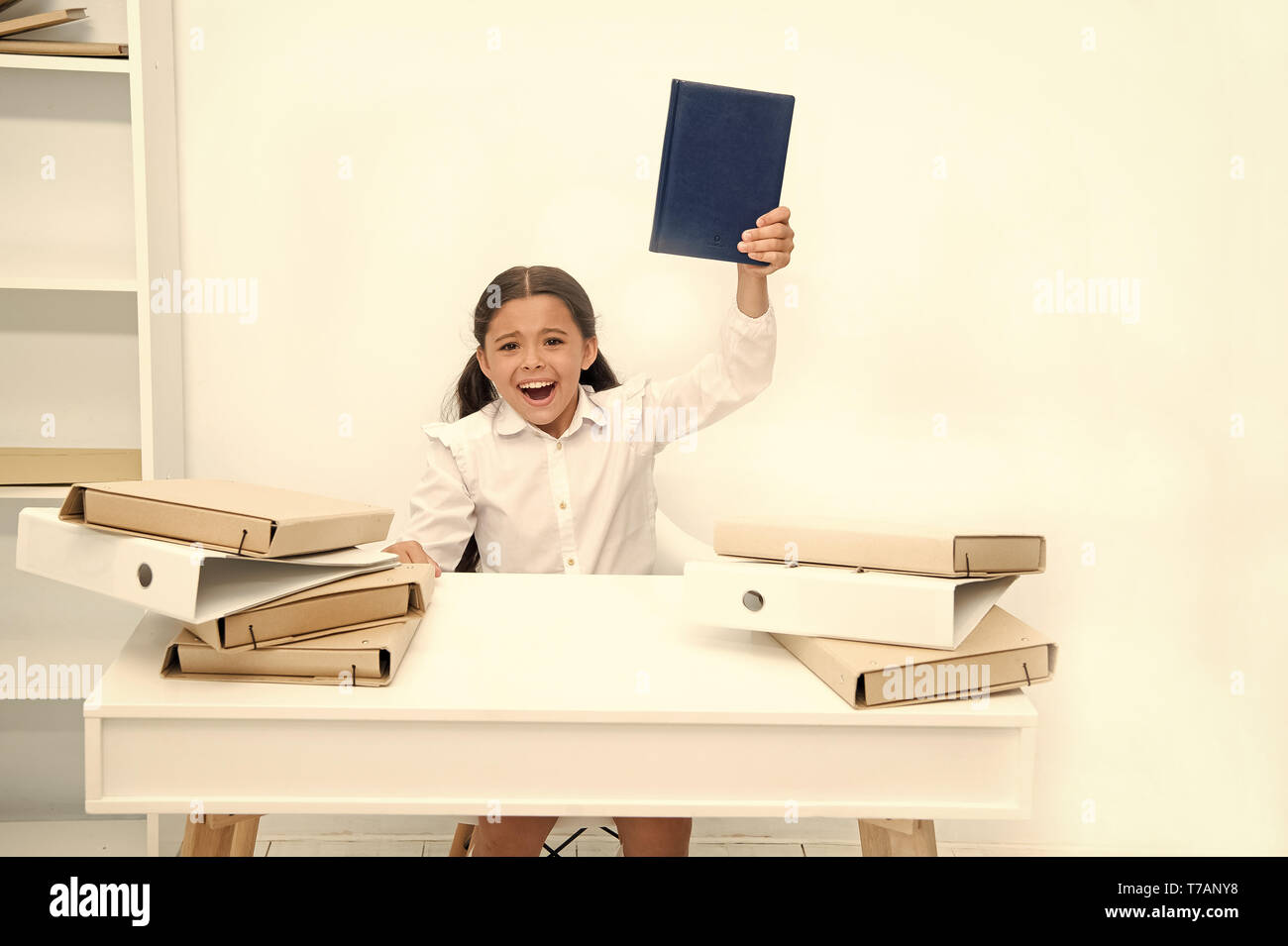 Stress concept. Little girl in stress of paperwork. Cute child need ...