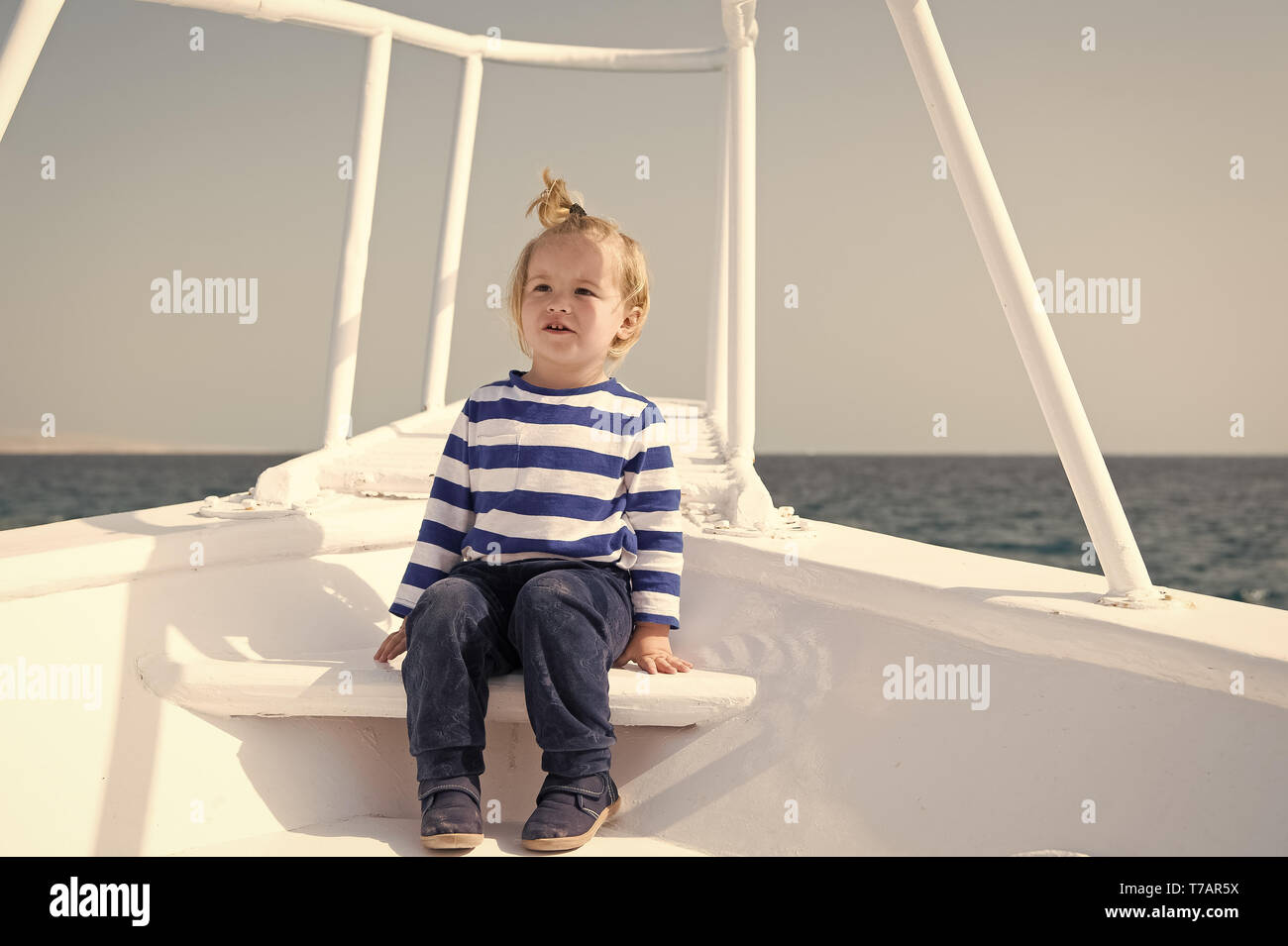 Young traveler. Child cute sailor yacht sunny day. Boy adorable sailor ...