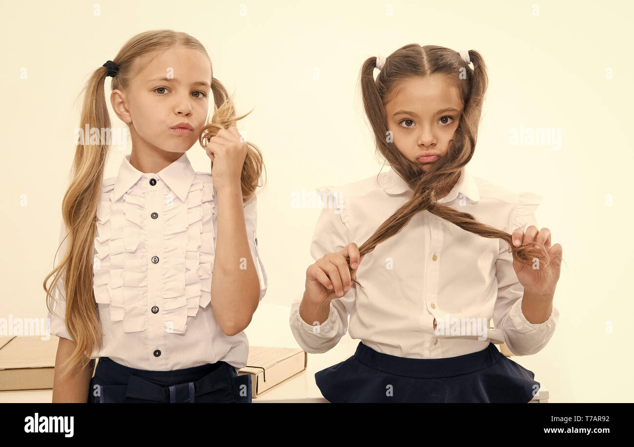 Small girls with tail hairdo. Children need new hairdo in hair salon ...